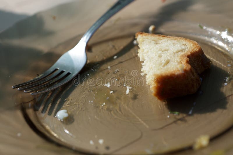 Remains of bread on plate stock image. Image of healthy - 97013059