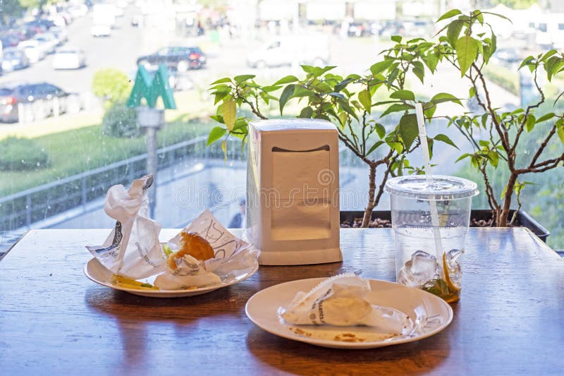 Remains of Food and Garbage after it on the Table in a Cafe. Stock ...