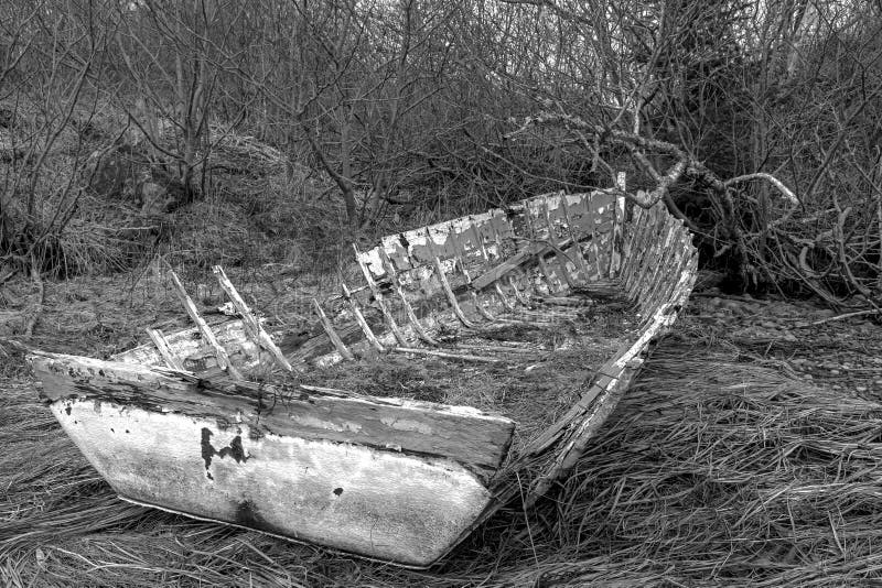 The Remains of an Old Rowboat in a Field Stock Photo - Image of empty ...