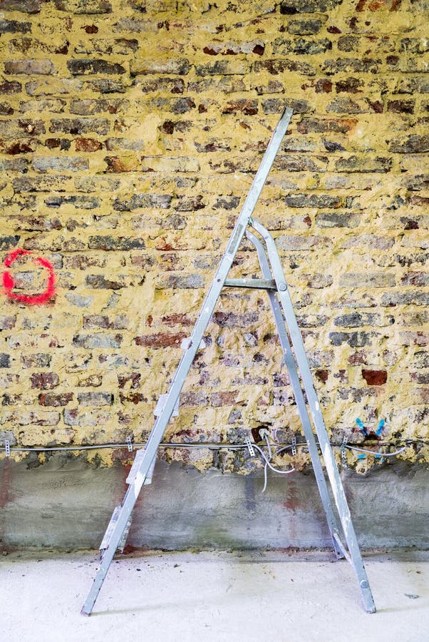 Remediation of Brick Wall and Ladder Stock Photo - Image of remediation ...