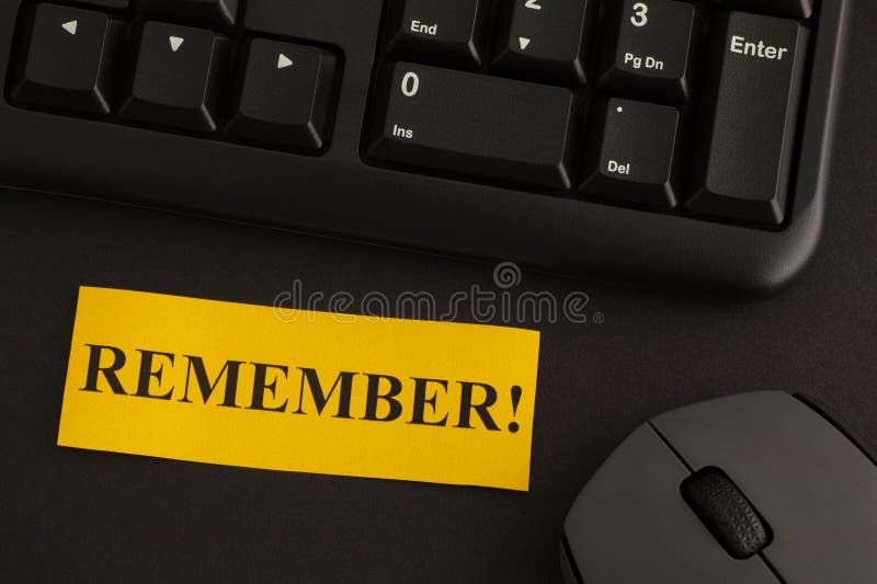 Remember! a Paper Note with the Word Remember on it on a Desk Stock ...