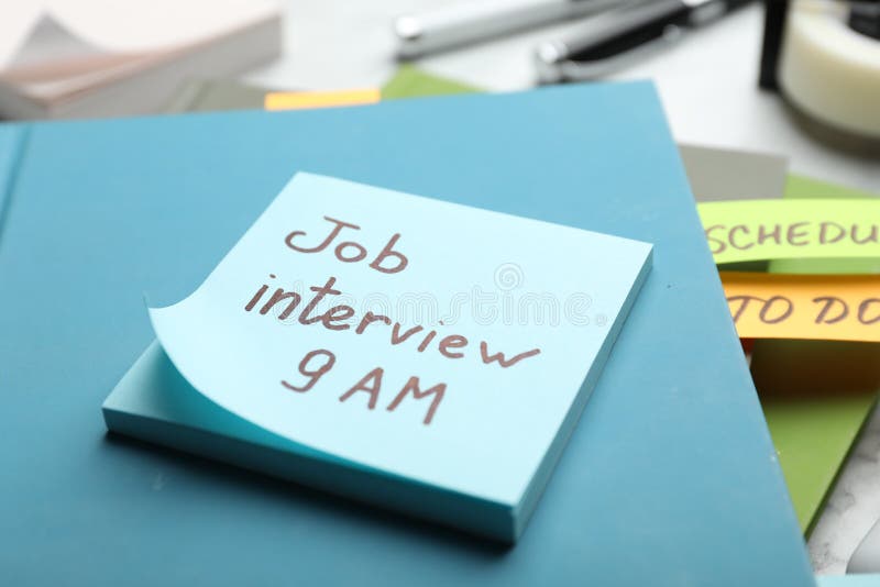 Reminder Note about Job Interview and Stationery on Table, Closeup ...