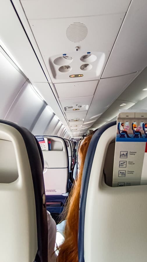 A Reminder for Passengers in Their Seats Editorial Stock Image - Image ...