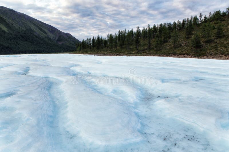 Remnants of Spring Ice in the Valley of a Mountain River. Stock Image ...