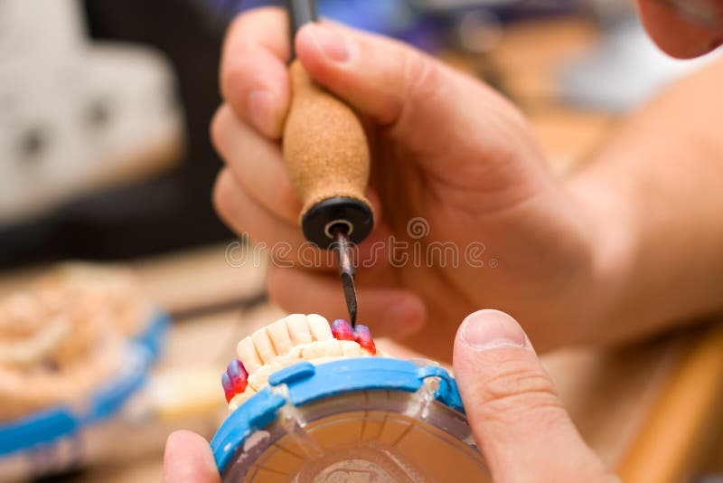 Remodeling of teeth of wax stock image. Image of modeling - 13638373