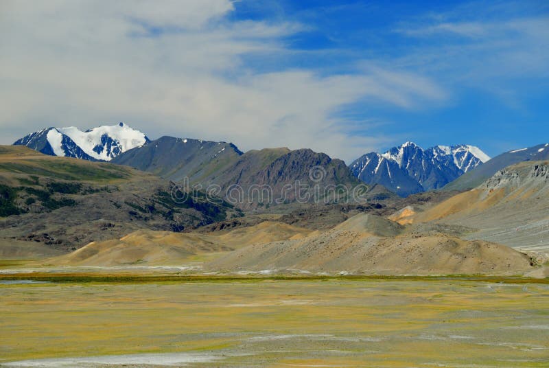 Remote Alpine country stock image. Image of clouds, peak - 66236713