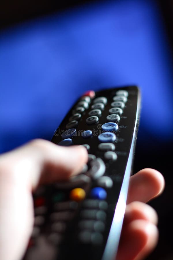 Couple Watching Television Using Remote Control Stock Image - Image of ...