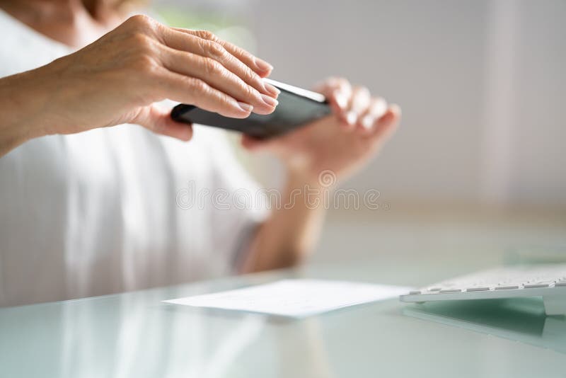 Remote Cheque Deposit Using Mobile Phone Stock Image - Image of ...