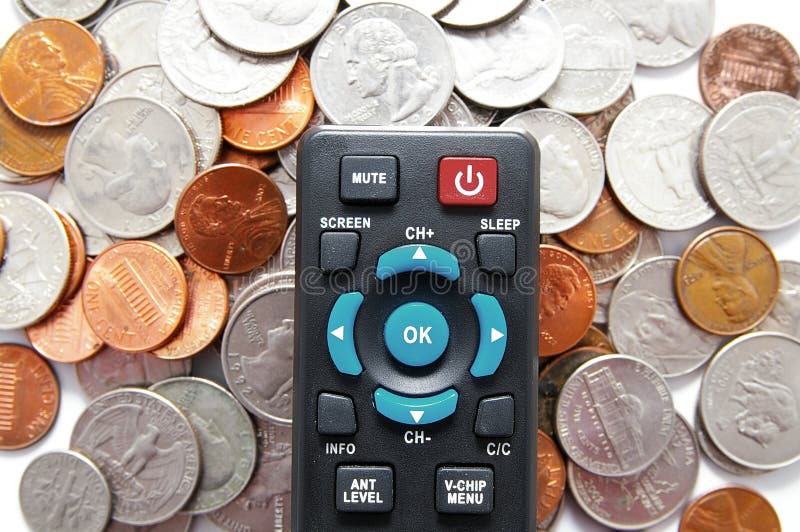 Remote control and coins stock photo. Image of expensive - 19140032