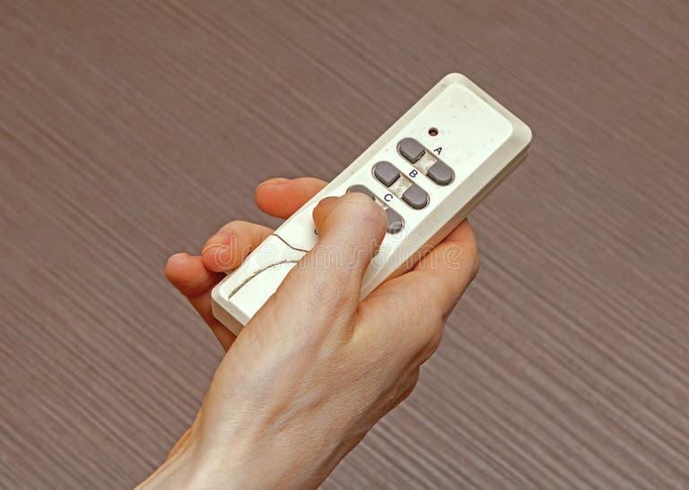 Remote Control in Female Hand Stock Image - Image of female, simple ...