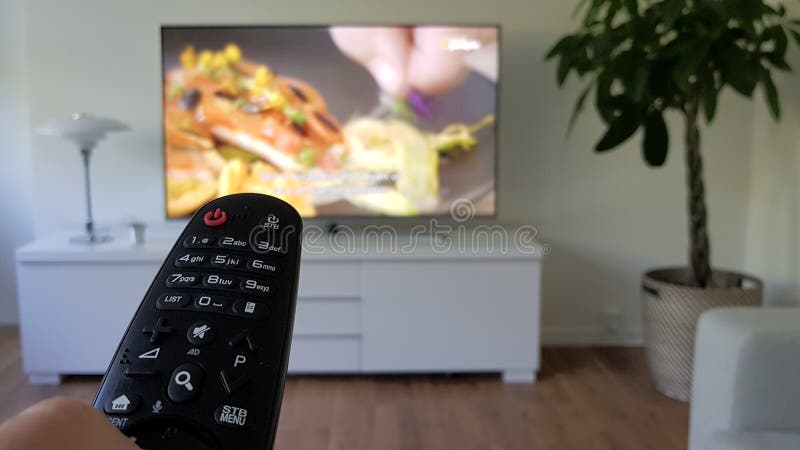 Remote Control in Front of Television Stock Photo - Image of front ...