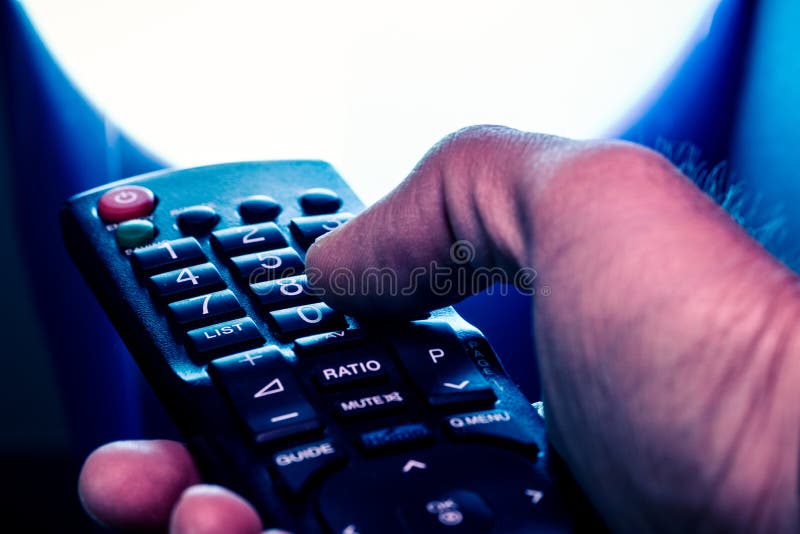 Remote control in hand stock image. Image of technology - 87956011