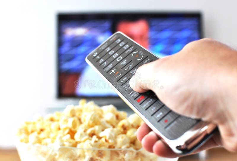 Pop-corn and TV stock image. Image of home, switch, hand - 37396549