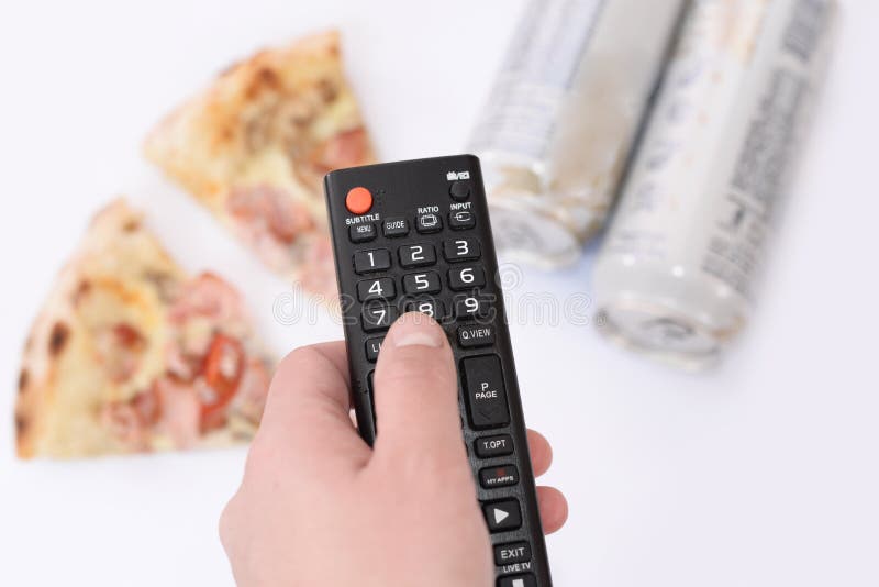 Remote Control in Hand on a Background of Pizza and Beer Stock Image ...