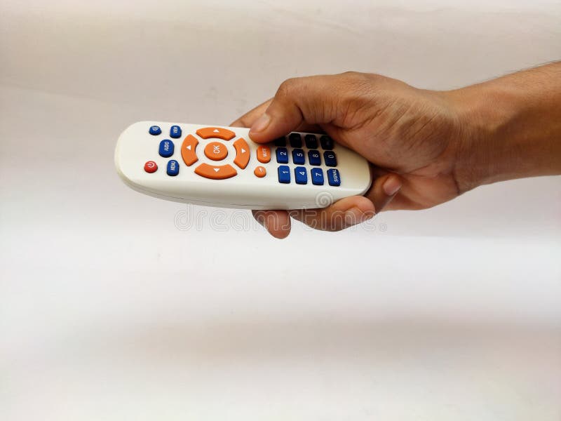Remote Control in Hand stock photo. Image of hand, home - 182780426