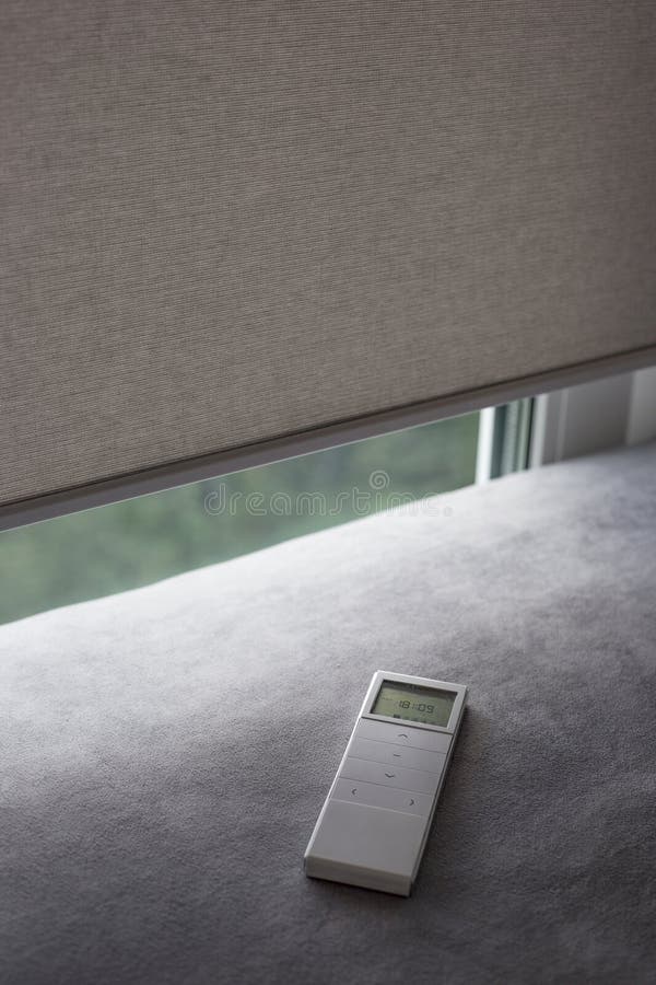 Remote Control Panel for Motorized Roller Shades Stock Photo - Image of ...