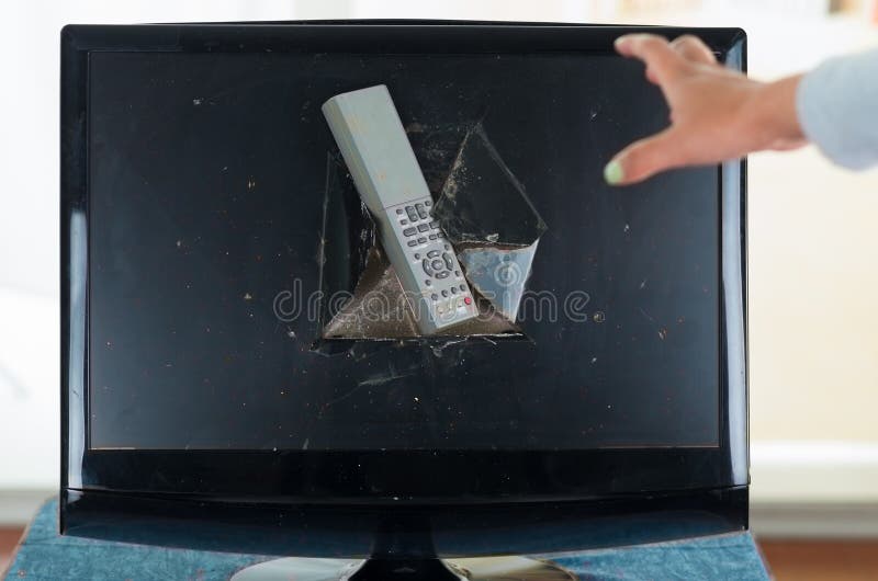 Remote Control Stuck Inside Broken Computer Screen Stock Image - Image ...