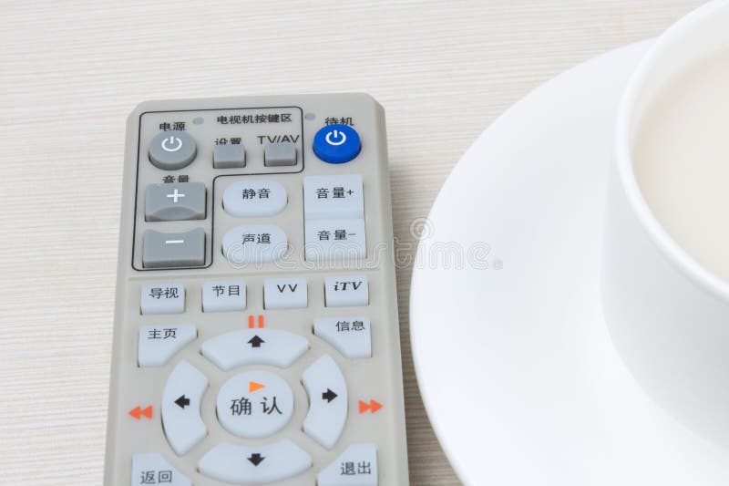 Remote control and tea stock image. Image of drink, channel - 16776143