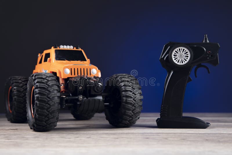 Remote control and toy car stock image. Image of electric - 268000253