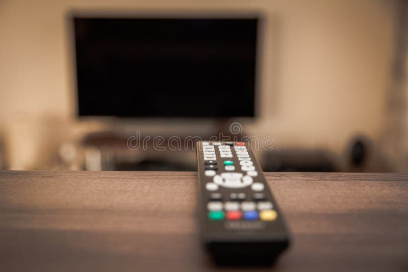 Remote Control of the TV in Action Stock Image - Image of display ...
