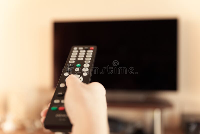 Remote Control of the TV in Action Stock Image - Image of media ...