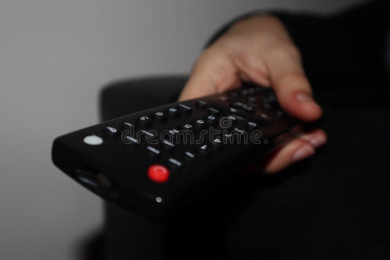 Remote Control in Woman Hand Stock Image - Image of electronics ...