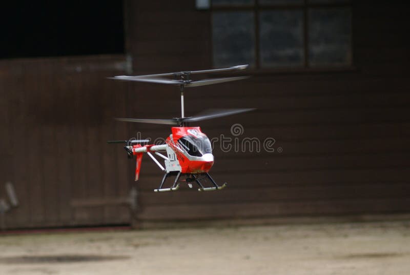 Remote Controlled Toy Helicopter in Flight Stock Photo - Image of ...