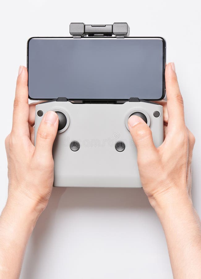 Remote Controller with Smartphone in Hands Stock Image - Image of ...