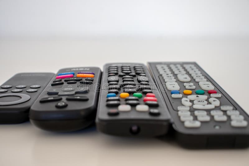The Remote Controls, One for Each Device Used Stock Image - Image of ...