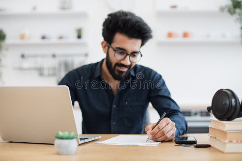 Remote Employee Making Notes on Paper in Workplace at Home Stock Image ...