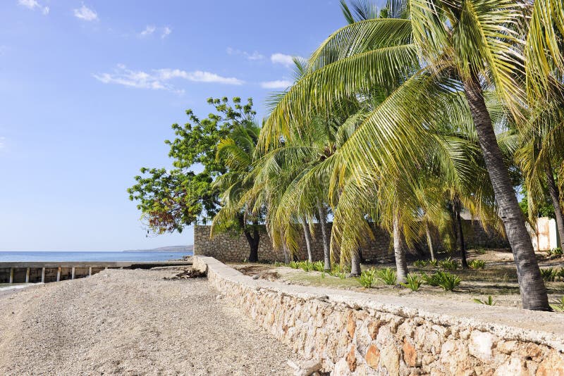 Remote Haitian Beach stock photo. Image of sand, wall - 49679182