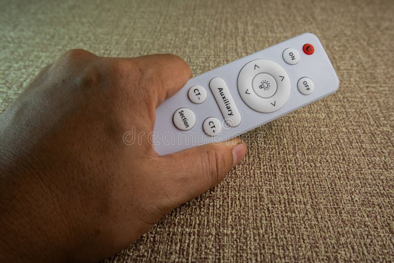 Remote on Hand stock photo. Image of equipment, lamp - 307014100