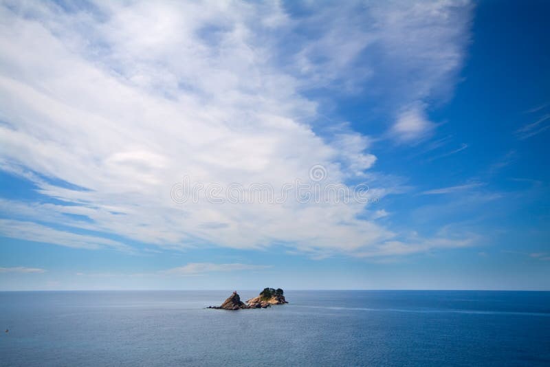 Remote island in the ocean stock image. Image of beautiful - 15344371