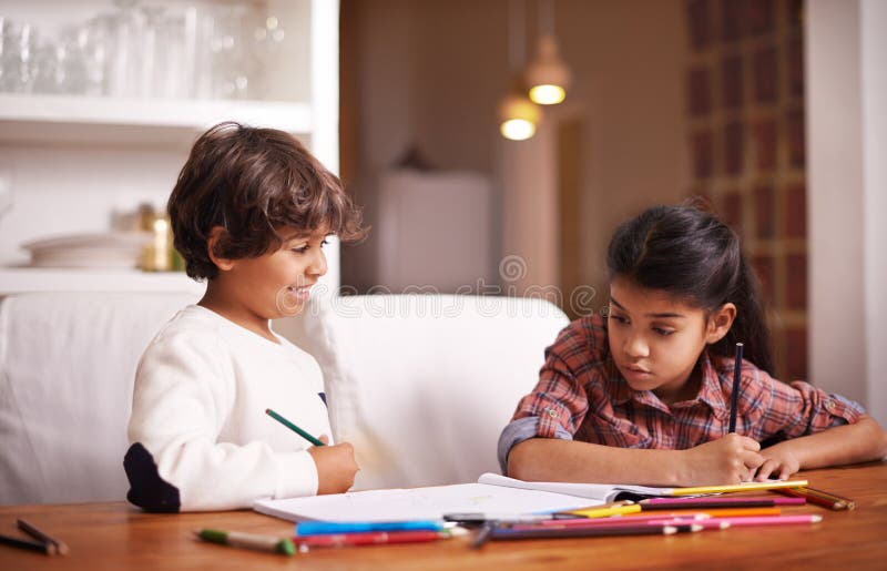 Remote Learning, Education and Kids in Kitchen with Book, Writing or ...