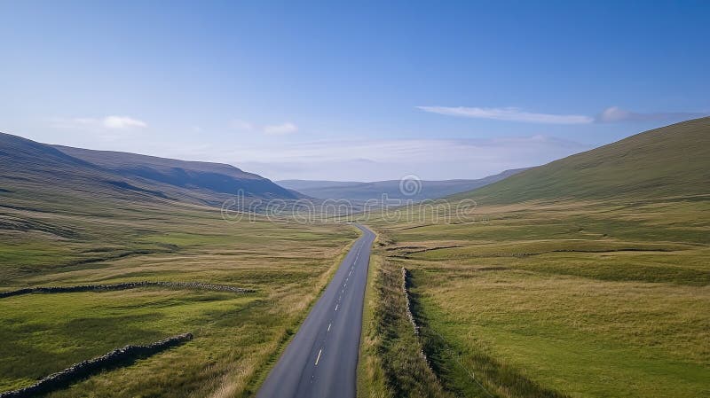 A Remote Road Cutting through a Vast Landscape Under an Open Sky Stock ...