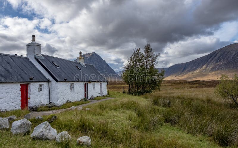Remote cottage in Glencoe stock image. Image of scenic - 213243335