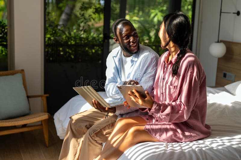 Remote Work and Digital Business. Diverse Couple Collaborating Online ...