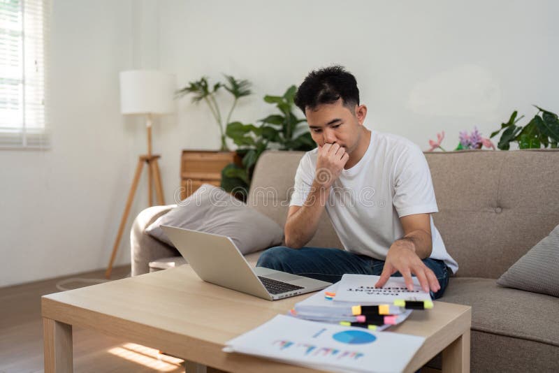 Remote Work and Focus. a Man Working from Home, Thoughtfully Assessing ...