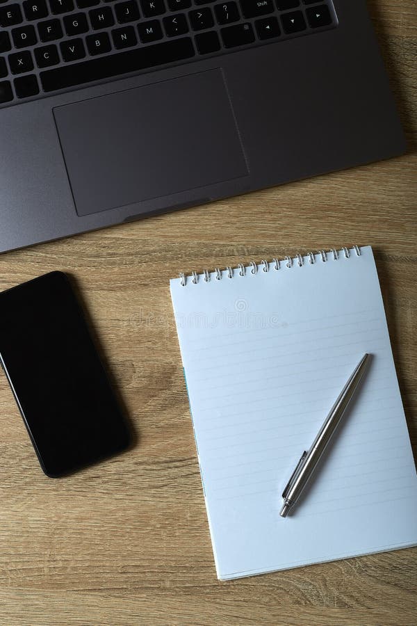Remote Work Laptop Notepad with Pen on the Table Stock Image - Image of ...