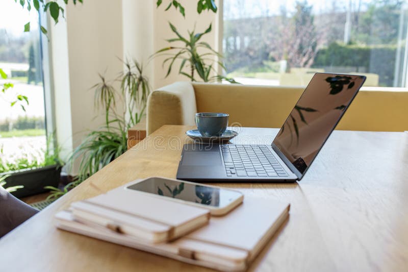 Remote Work Setup with Laptop, Coffee, and Smartphone Stock Image ...