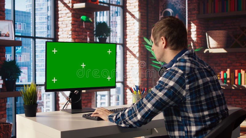 Remote Worker Doing Project Research, Typing on Green Screen Device ...