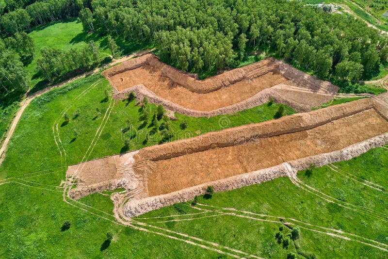 Removal of the Top Layer of Earth Overburden for the Development of a ...