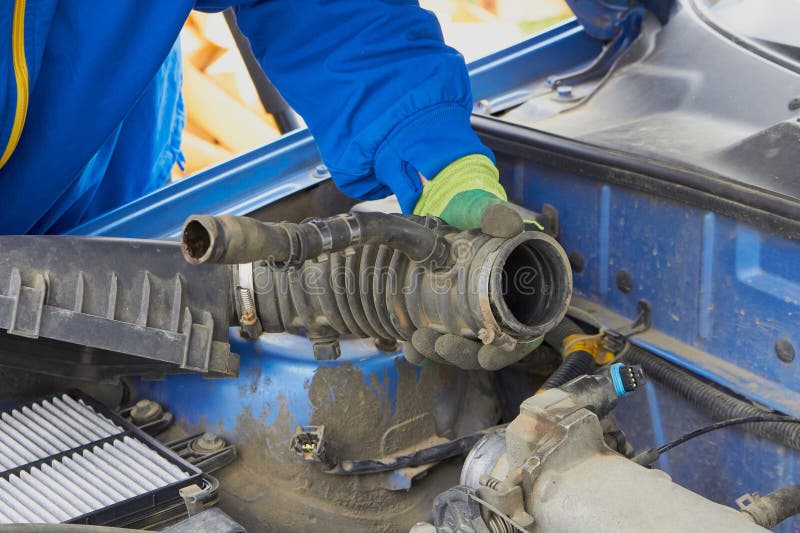 Remove the Air Pipe from the Car,the Mechanic Under the Hood Removes ...