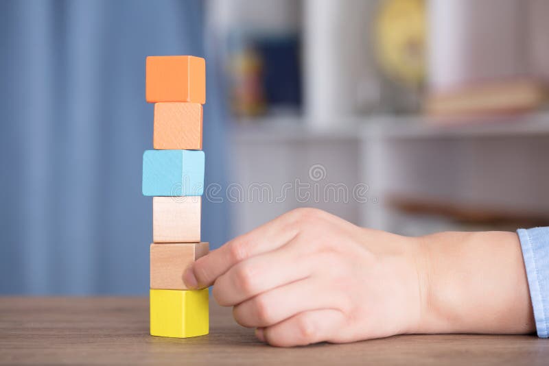 Remove the Blocks with One Hand Stock Image - Image of high, cubes ...