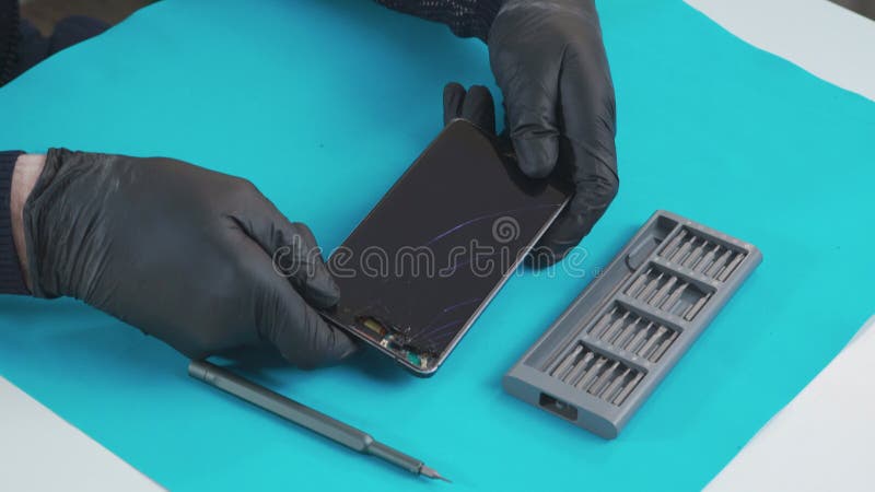 Removing a Broken Display from a Smartphone Stock Video - Video of ...