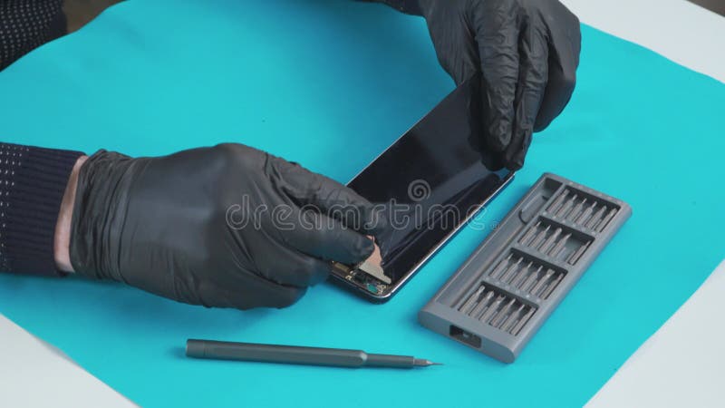 Removing a Broken Display from a Smartphone Stock Video - Video of ...