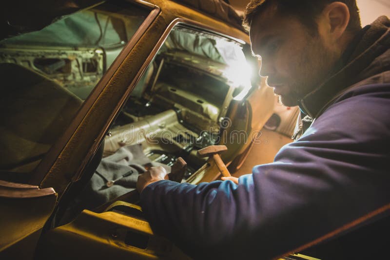 Removing Car Door with Mallet and Chisel Stock Image - Image of ...