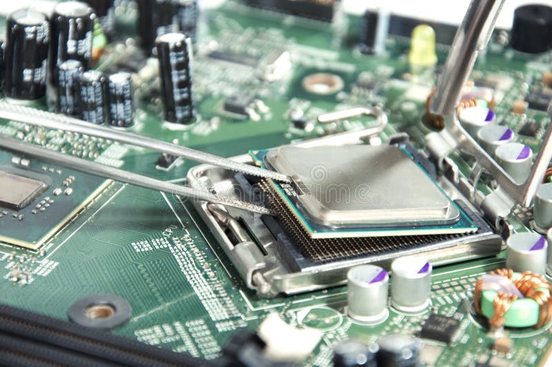 Removing CPU from Motherboard Stock Image - Image of technology, metal ...