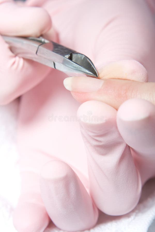 Removing Cuticle from the Nail Stock Image - Image of skin, cosmetic ...