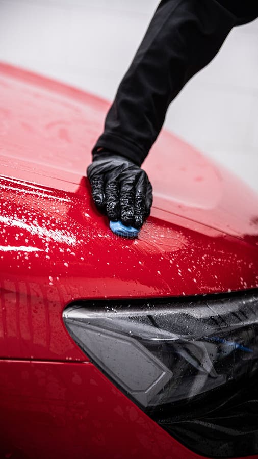 Removing Dirt from the Paint of a Modern Red Car Stock Image - Image of ...